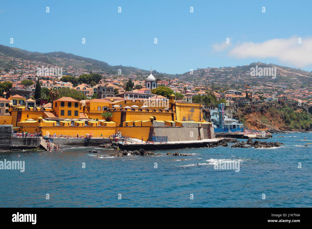 City beach and ancient fortress. Funchal, Madeira, Portugal Stock Photo ...