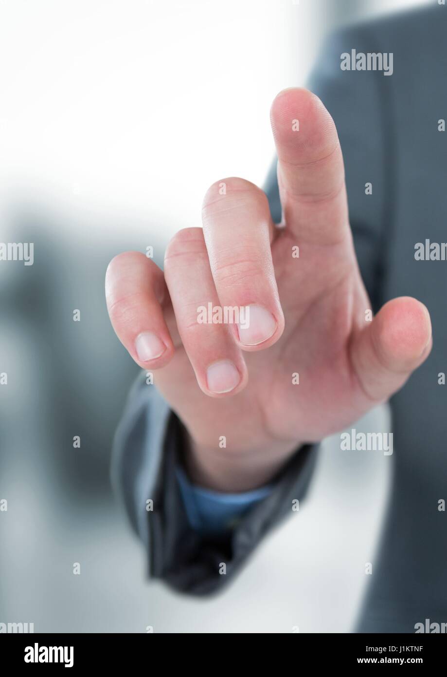 Digital composite of Close-up of hand touching screen Stock Photo - Alamy