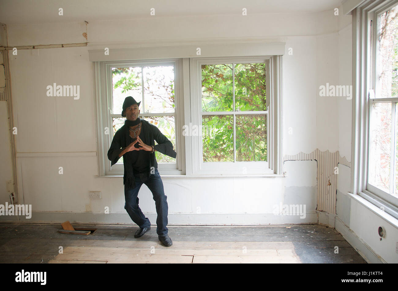 Young black contemporary dancer in an abandoned house Stock Photo - Alamy