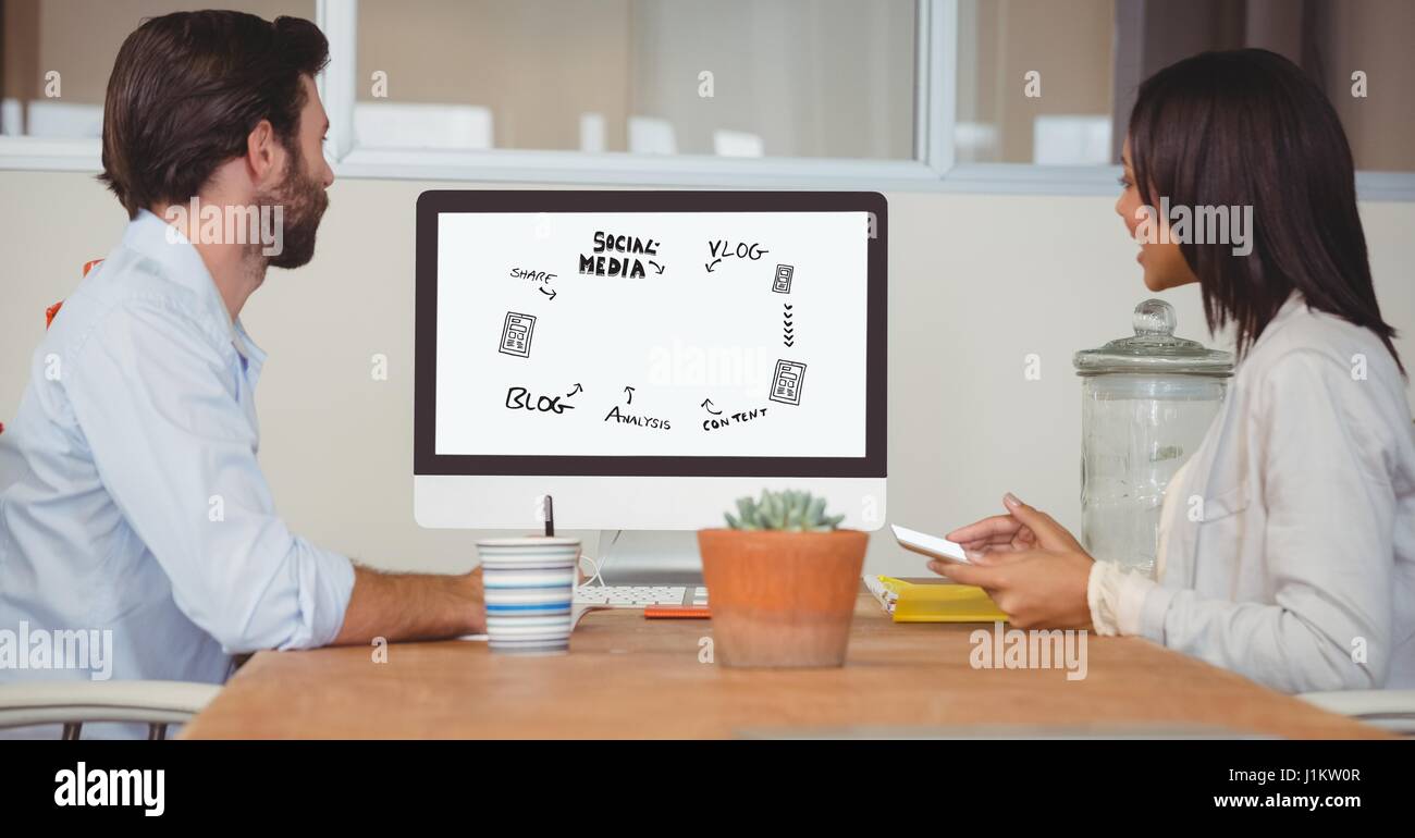 Digital composite of Business people looking at various icons on ...