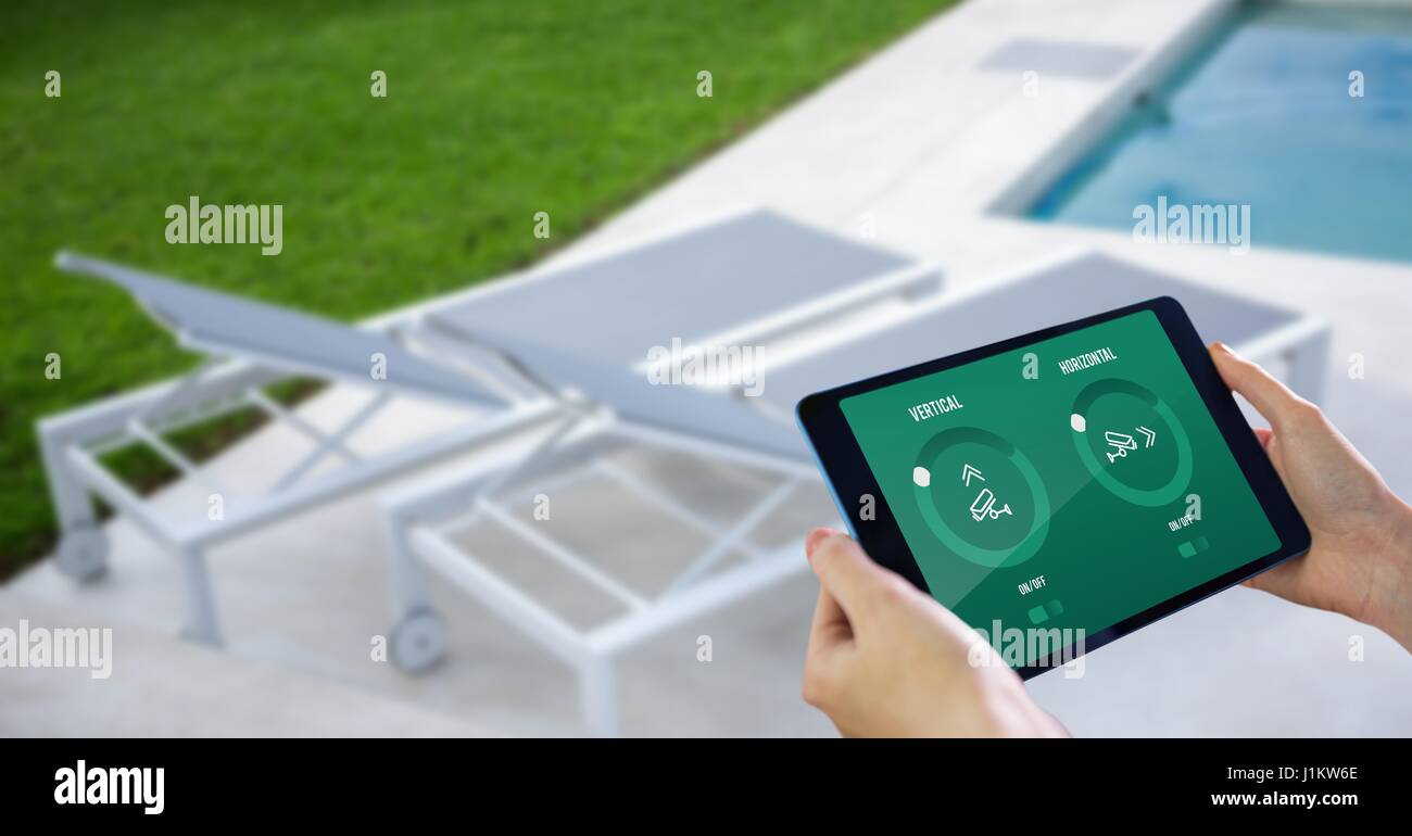 Digital composite of Hands using smart home application on digital ...