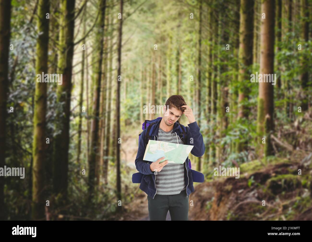 Man holding map scratching head hi-res stock photography and images - Alamy