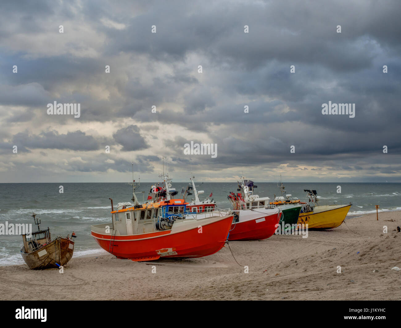 Chlopy, Poland - July 29, 2016: Colourful fishing boats in a harbour ...
