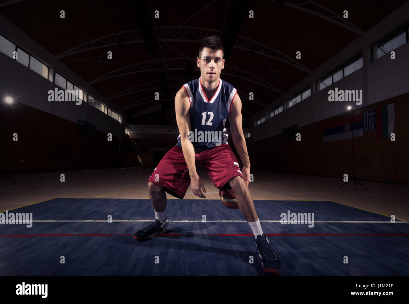 one young adult man, basketball player, ball Between the legs Stock ...