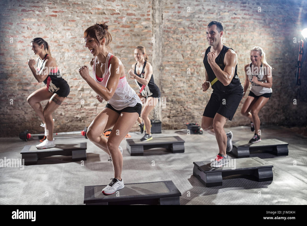 Group of positive people on steppers class Stock Photo - Alamy