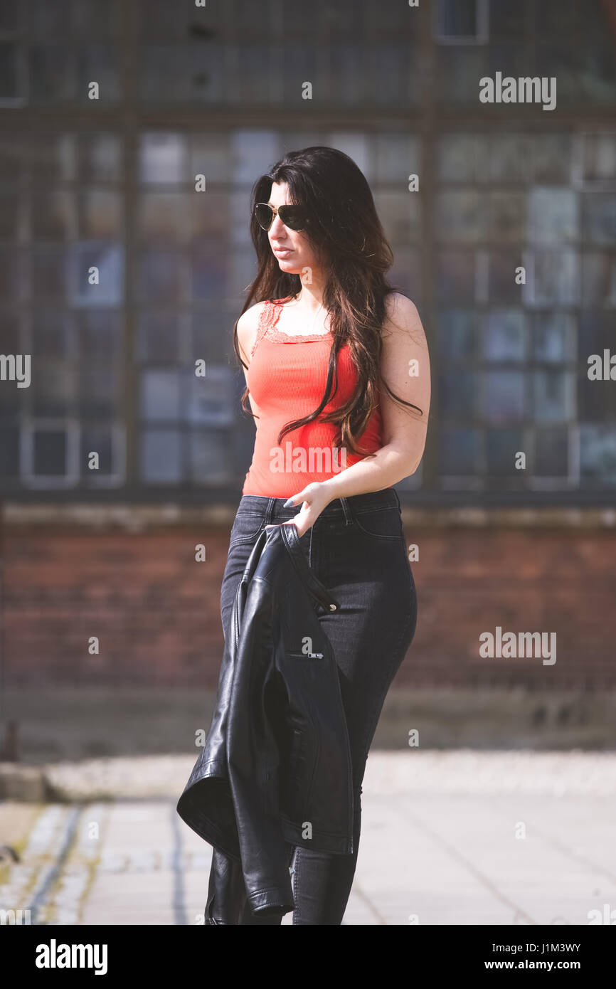 Beautiful woman in red top Stock Photo - Alamy