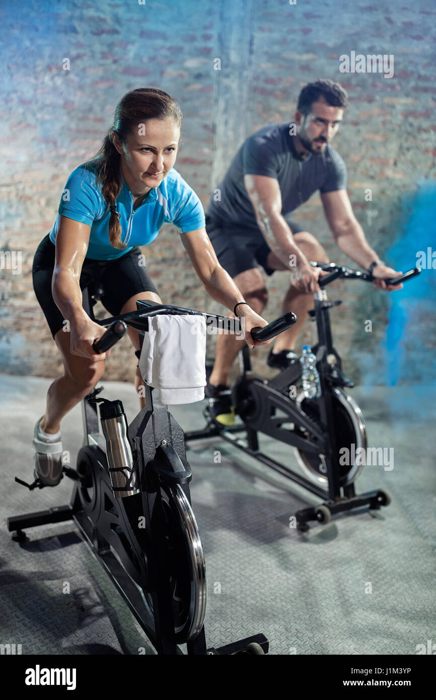 cardio exercise class on bikes, healthy lifestyle Stock Photo - Alamy