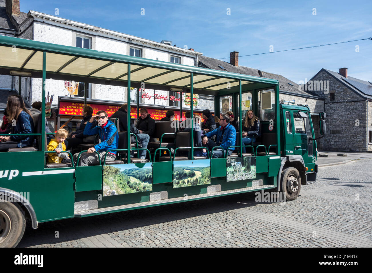 Safari train taking visitors to the wildlife park in the Domain of the ...