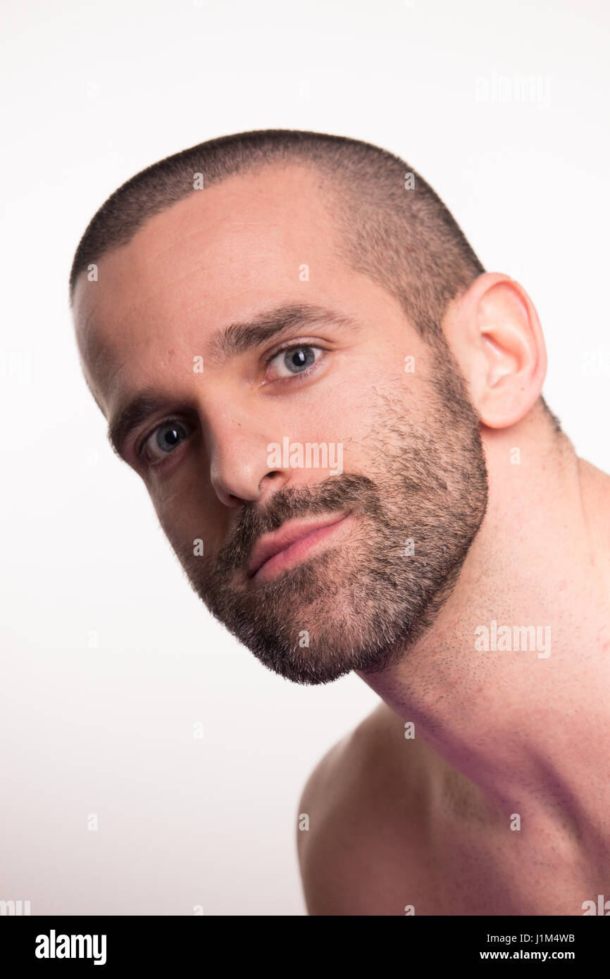 one young adult man head face, short hair, white background, shirtless ...