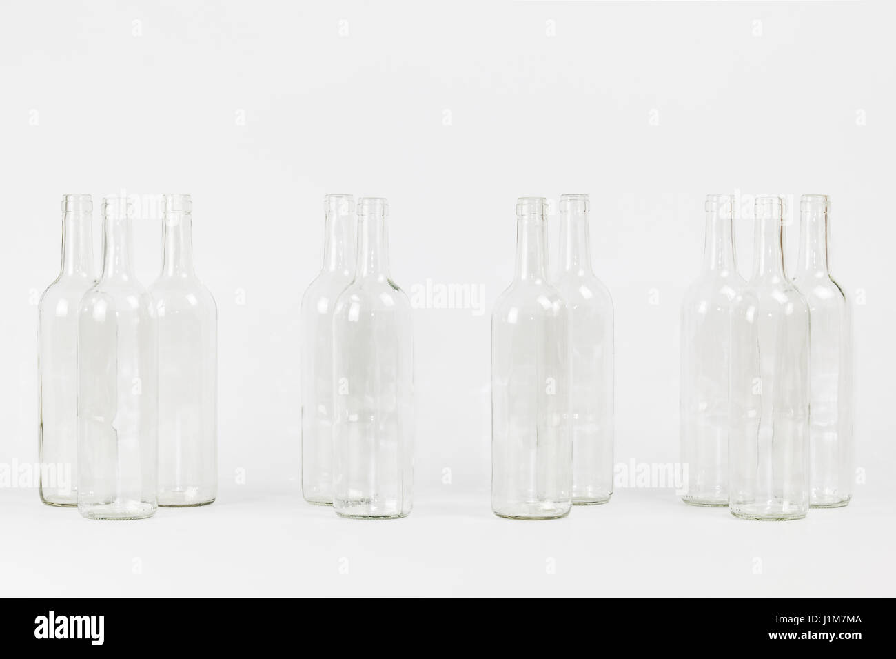 Group of empty glass bottle isolated on white background Stock Photo ...