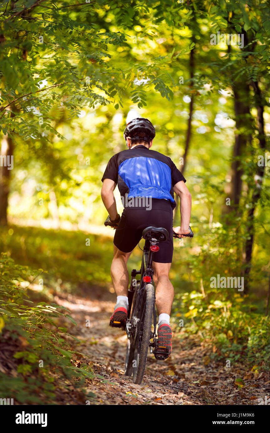 man riding mountain bike, concept - mountain bike Stock Photo - Alamy