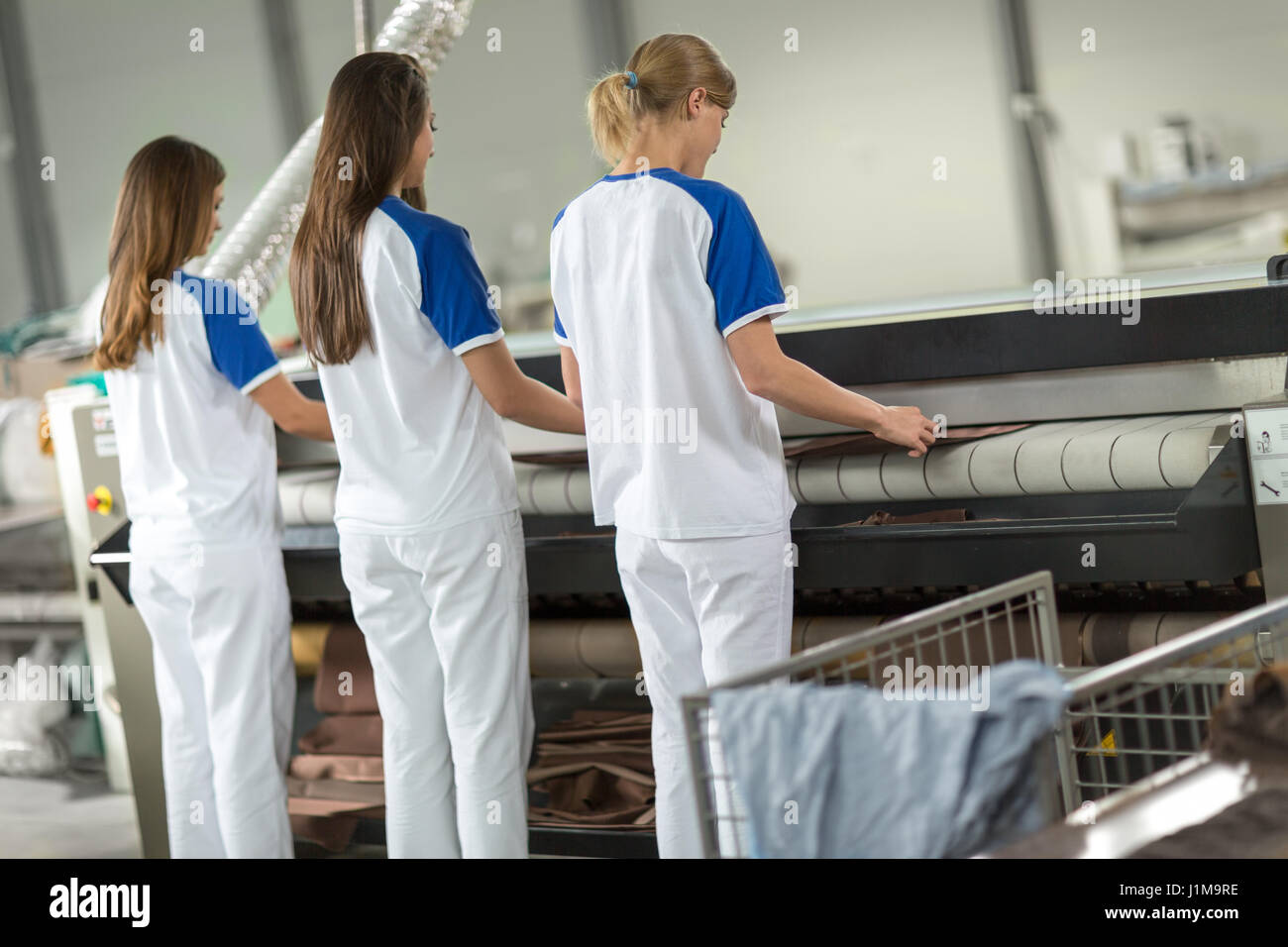 Employee and machine hi-res stock photography and images - Alamy