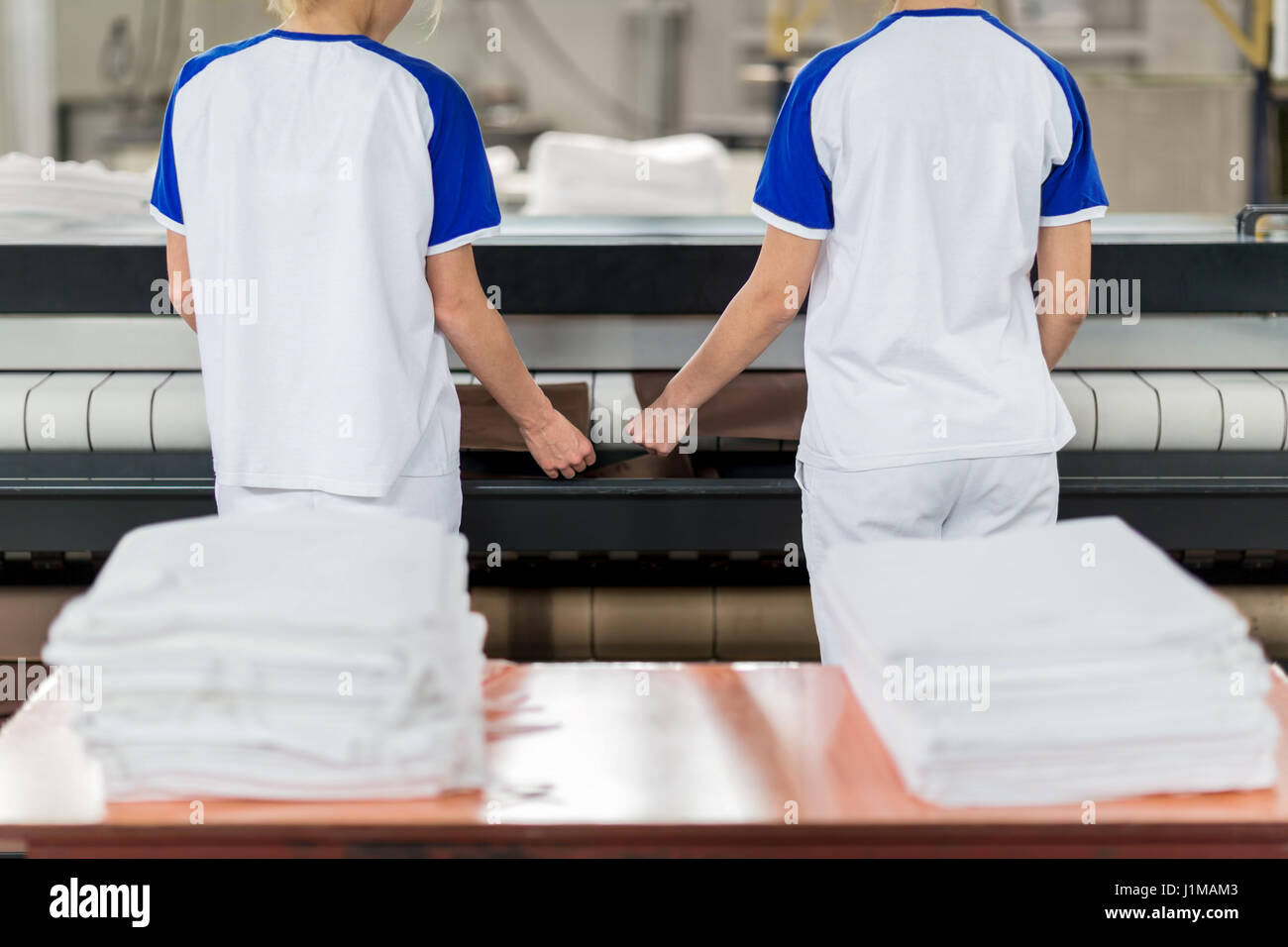 Ironing machine hi-res stock photography and images - Alamy