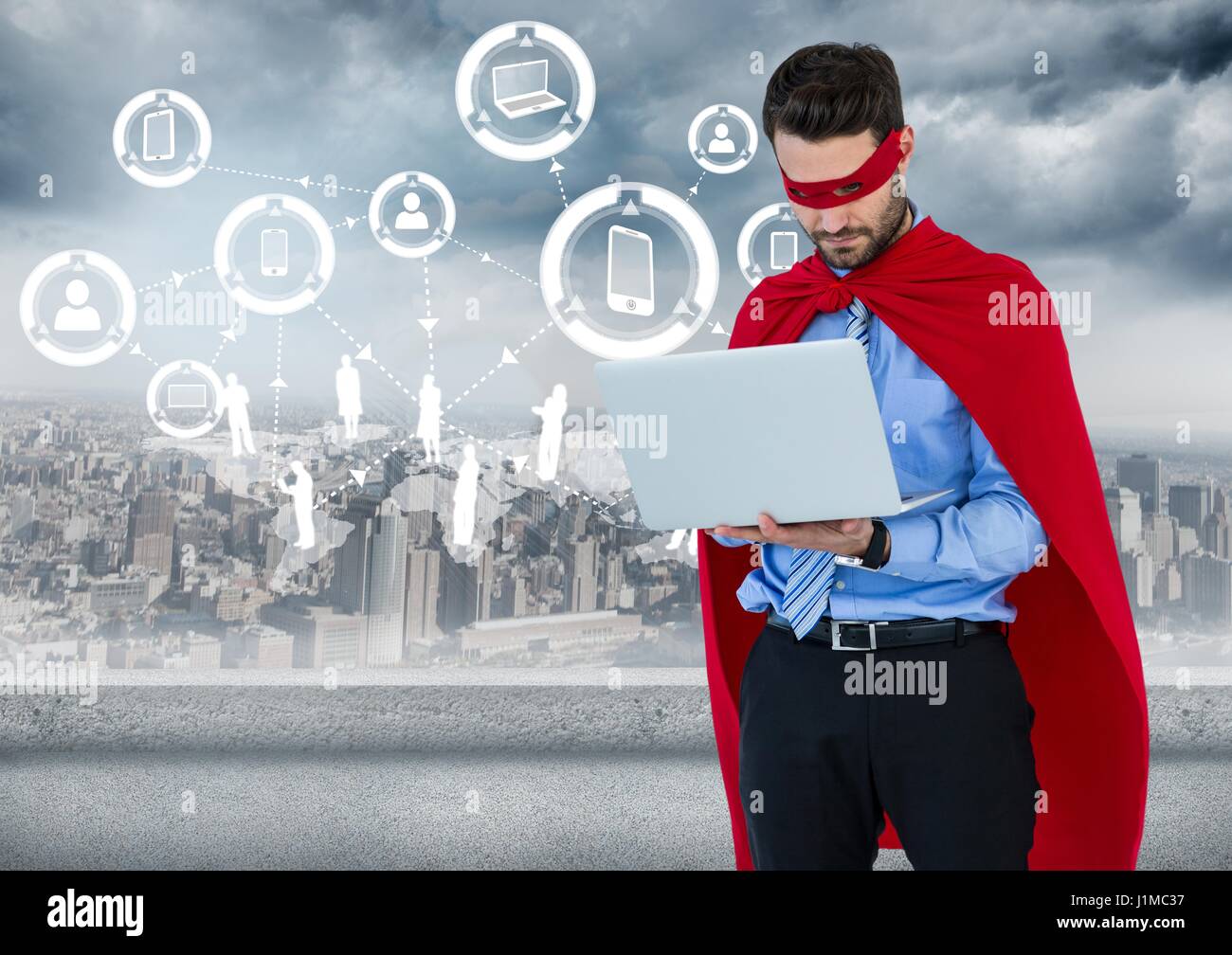 Digital composite of Business man superhero with laptop against skyline ...