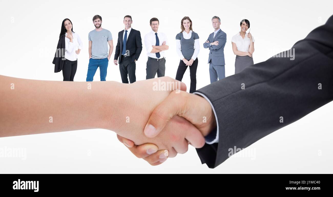 Digital composite of Close-up of handshake with business people in ...