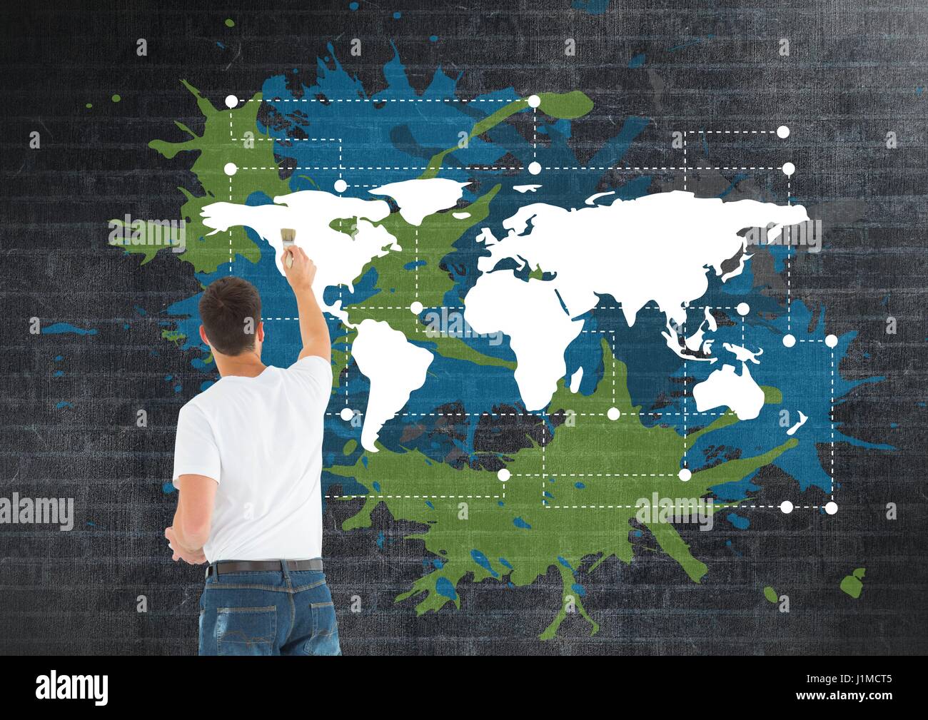 Digital composite of Man painting a Colorful Map with paint splatters ...