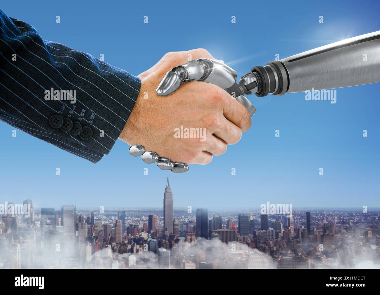 Digital composite of Android Robot hand shaking businessman hand with ...