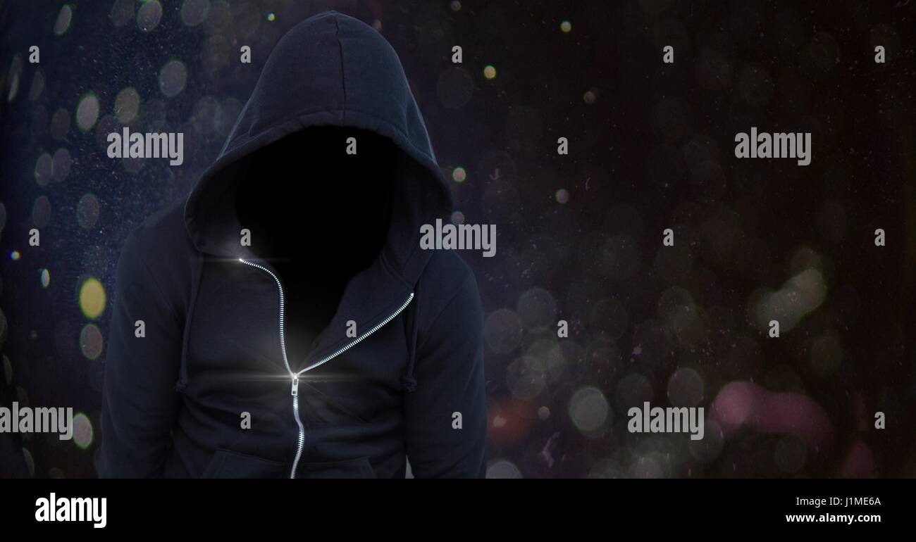 Digital composite of Anonymous man wearing hood in front of lights ...