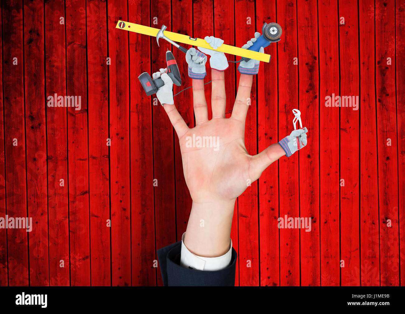 Digital composite of Hand with hands with tools on the fingers. Red ...