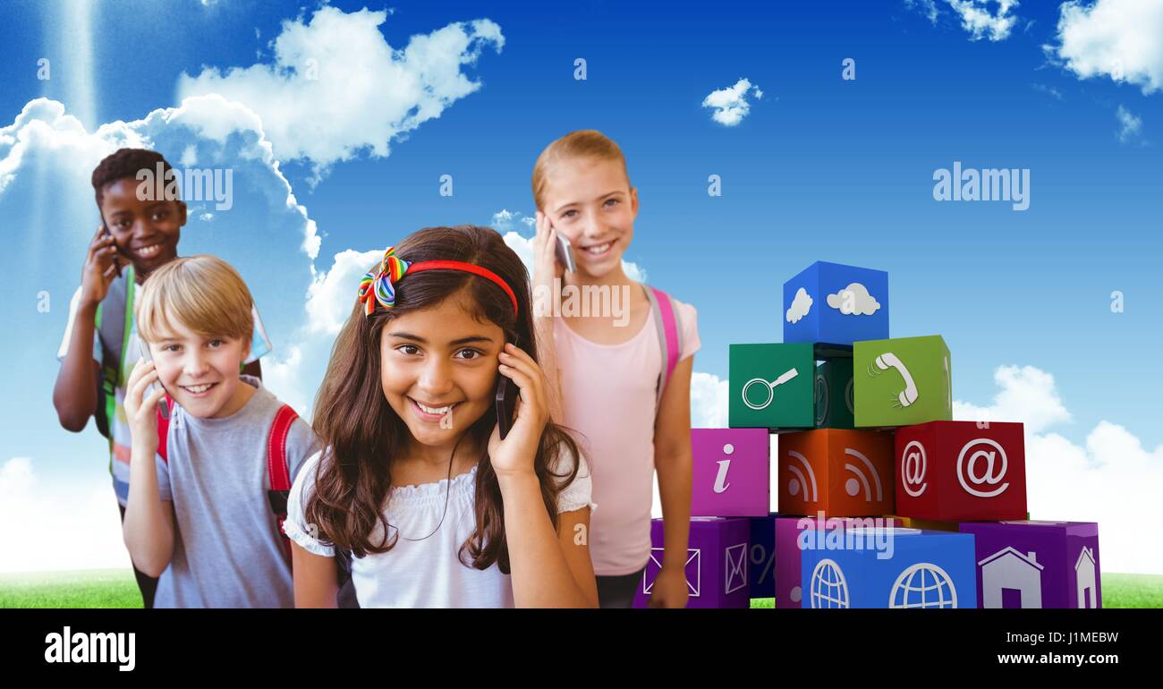 Digital composite of Happy kids using smart phones with apps icons in ...