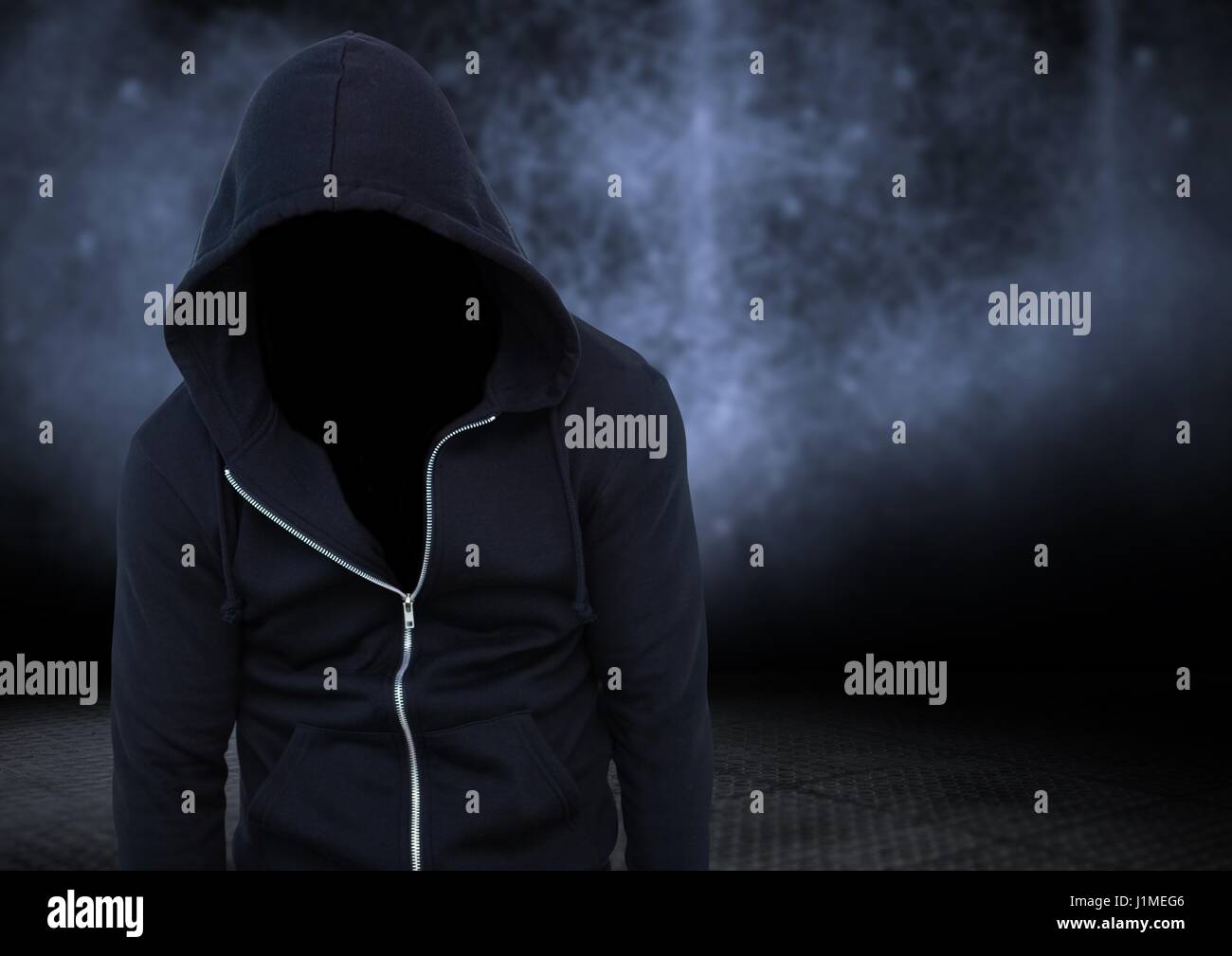 Digital composite of Anonymous criminal against dark background Stock ...