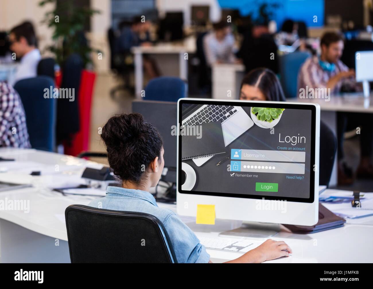 Digital composite of Woman in the office with login screen Stock Photo ...