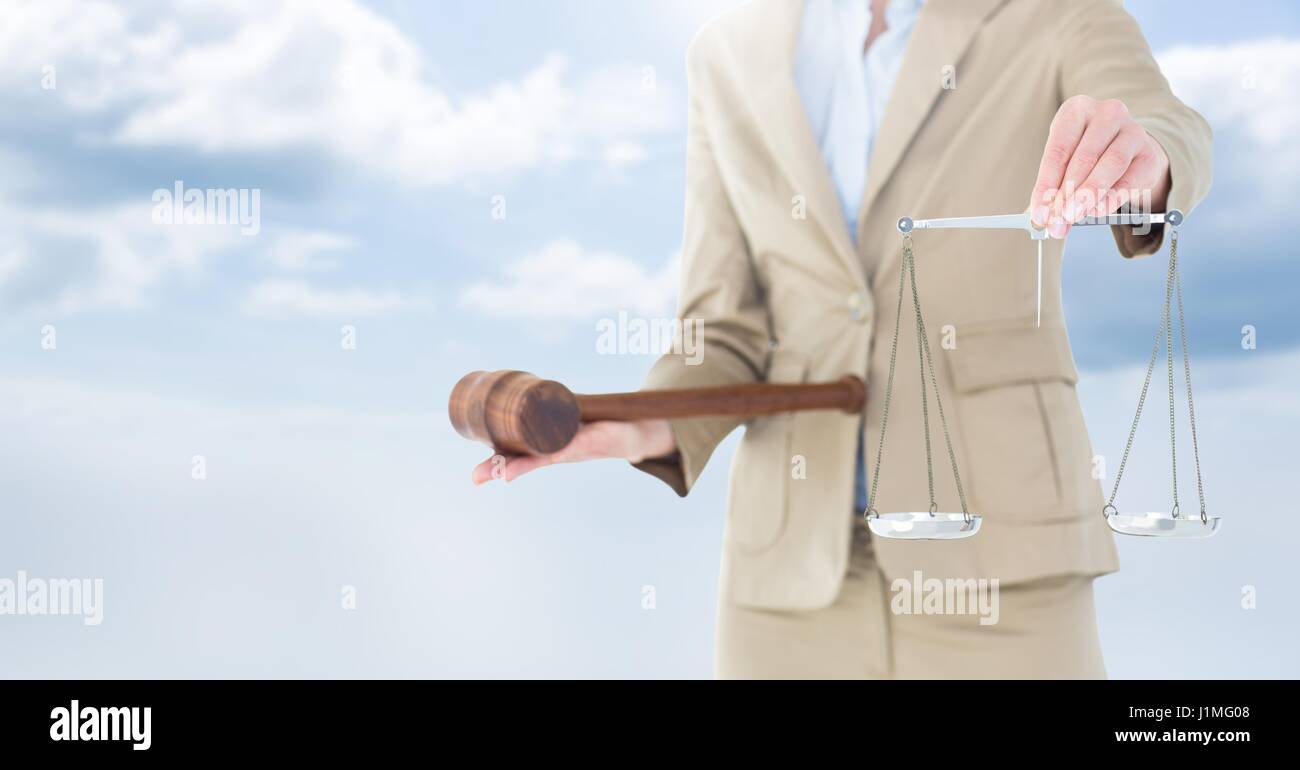 Digital composite of Judge with balance scale and hammer in front of ...