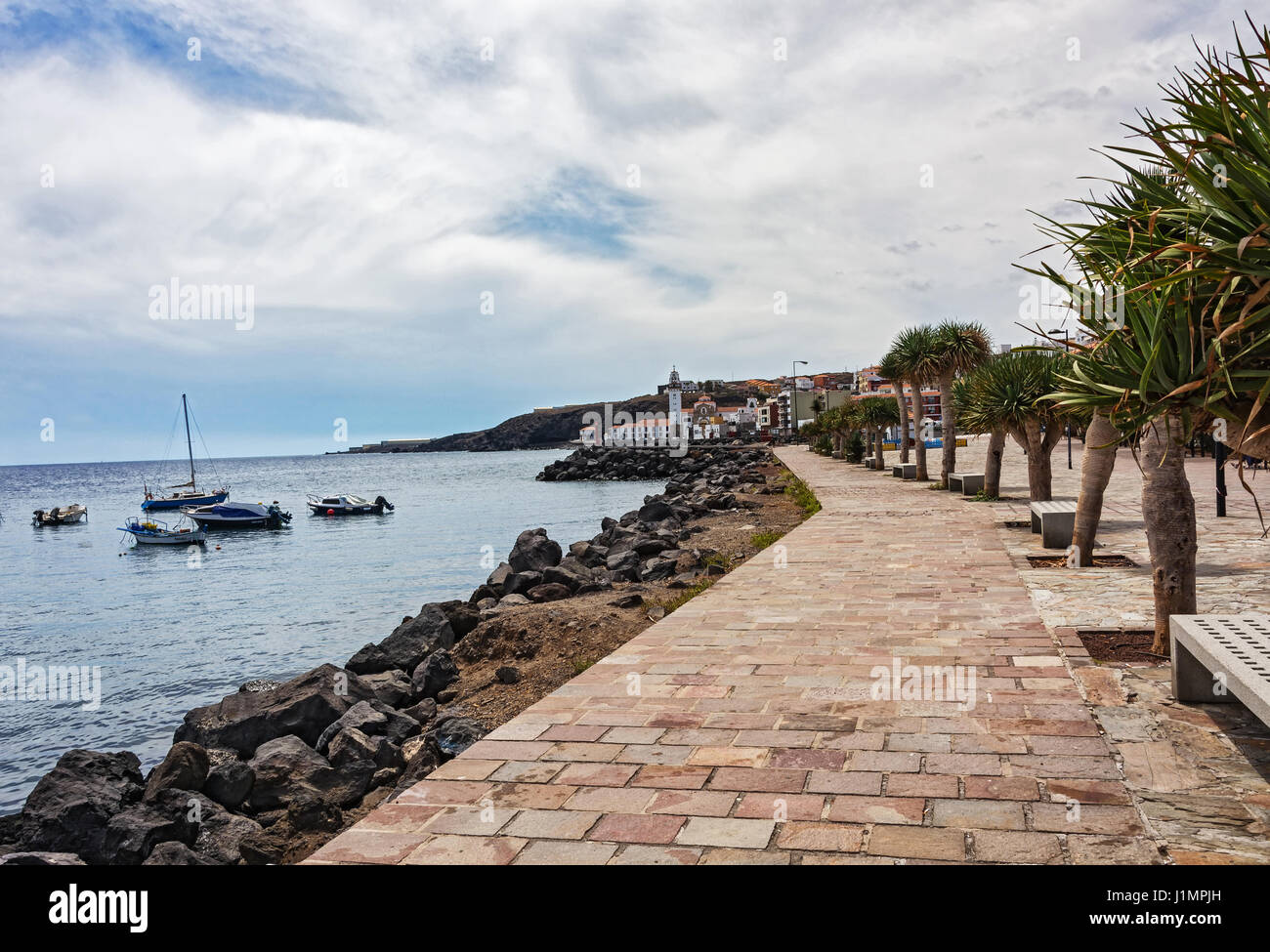 Sidewalk on the promenade of the city of Candelaria on the island of ...