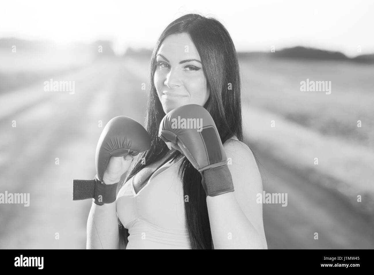 Woman in boxing gloves Stock Photo - Alamy