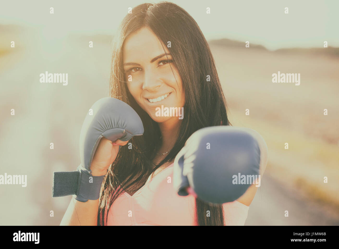 Woman in boxing gloves Stock Photo - Alamy
