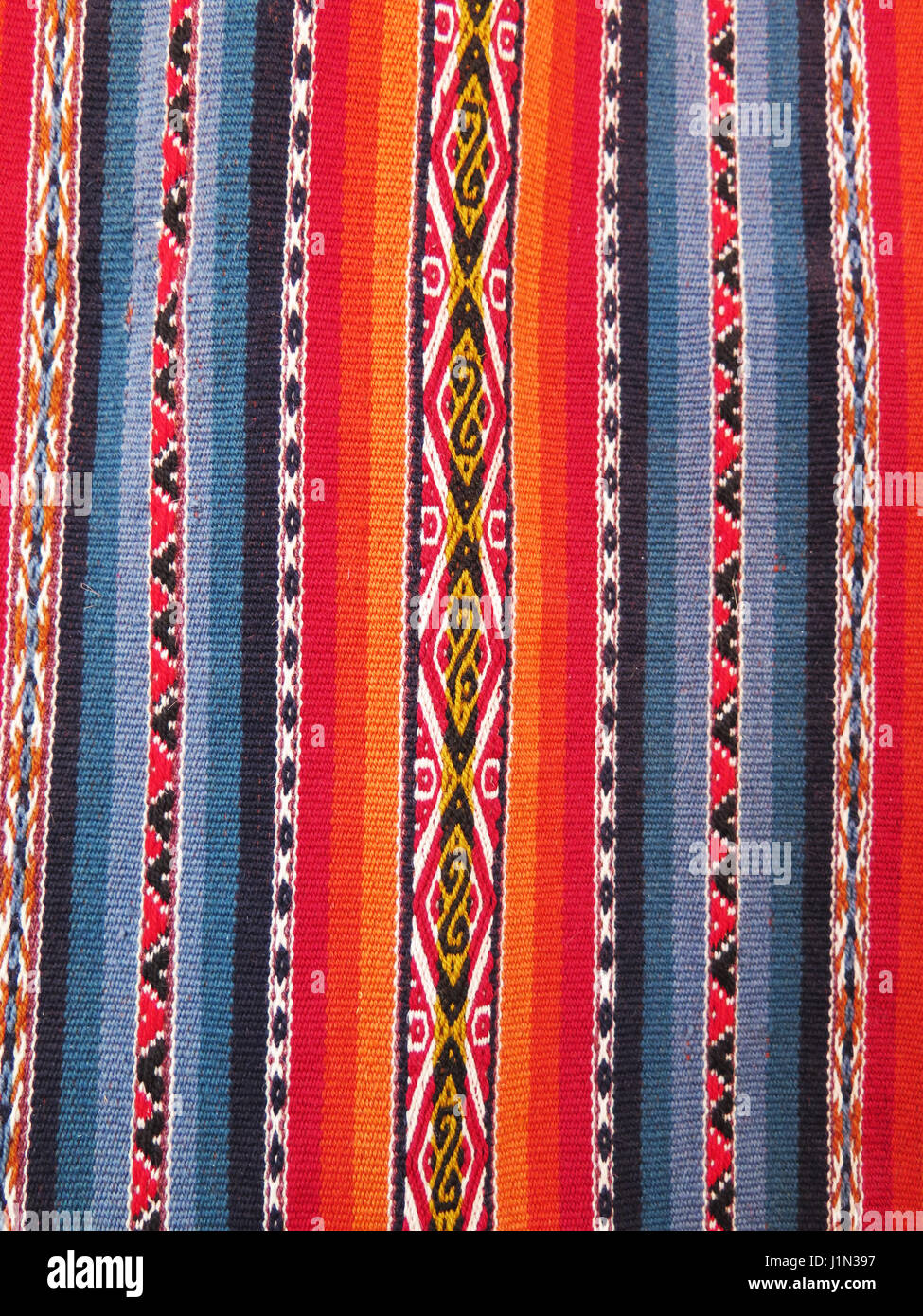 Peruvian hand made woolen fabric background Stock Photo - Alamy