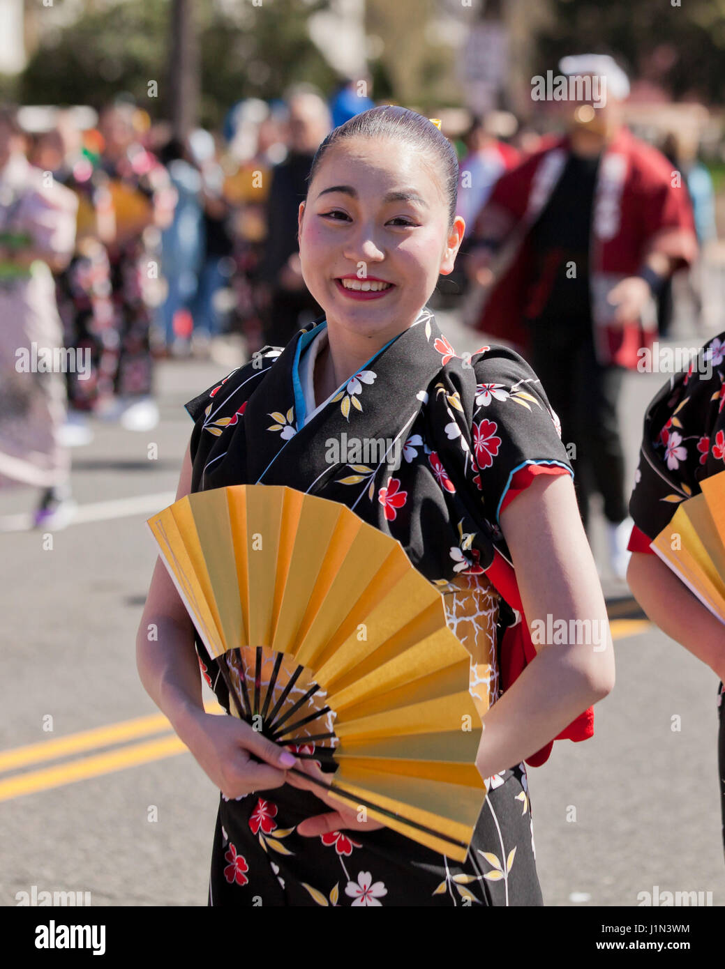 Young Japanese girls marching in the National Cherry Blossom Festival ...