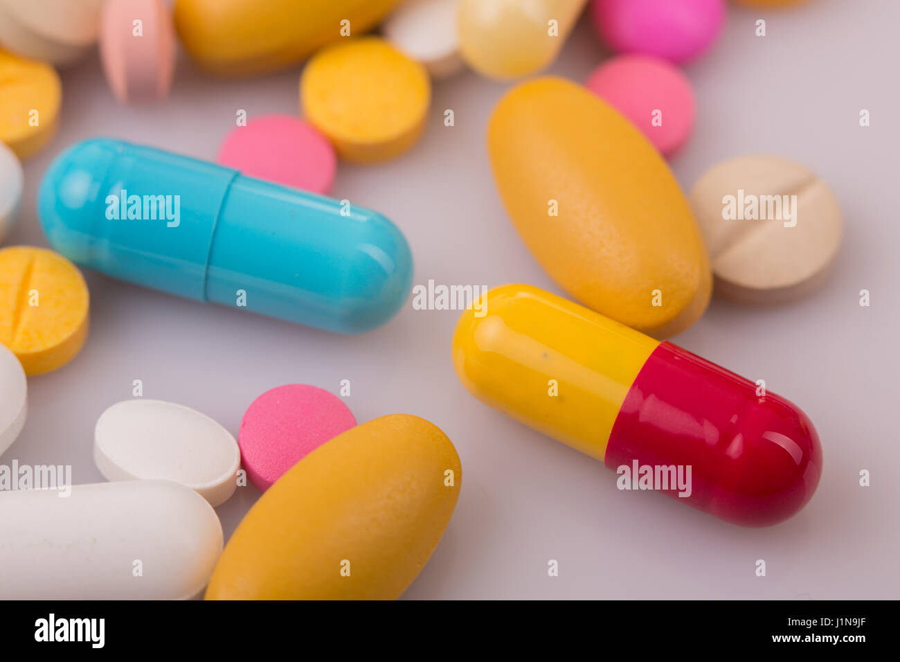 different Tablets pills capsule heap mix therapy drugs Stock Photo - Alamy