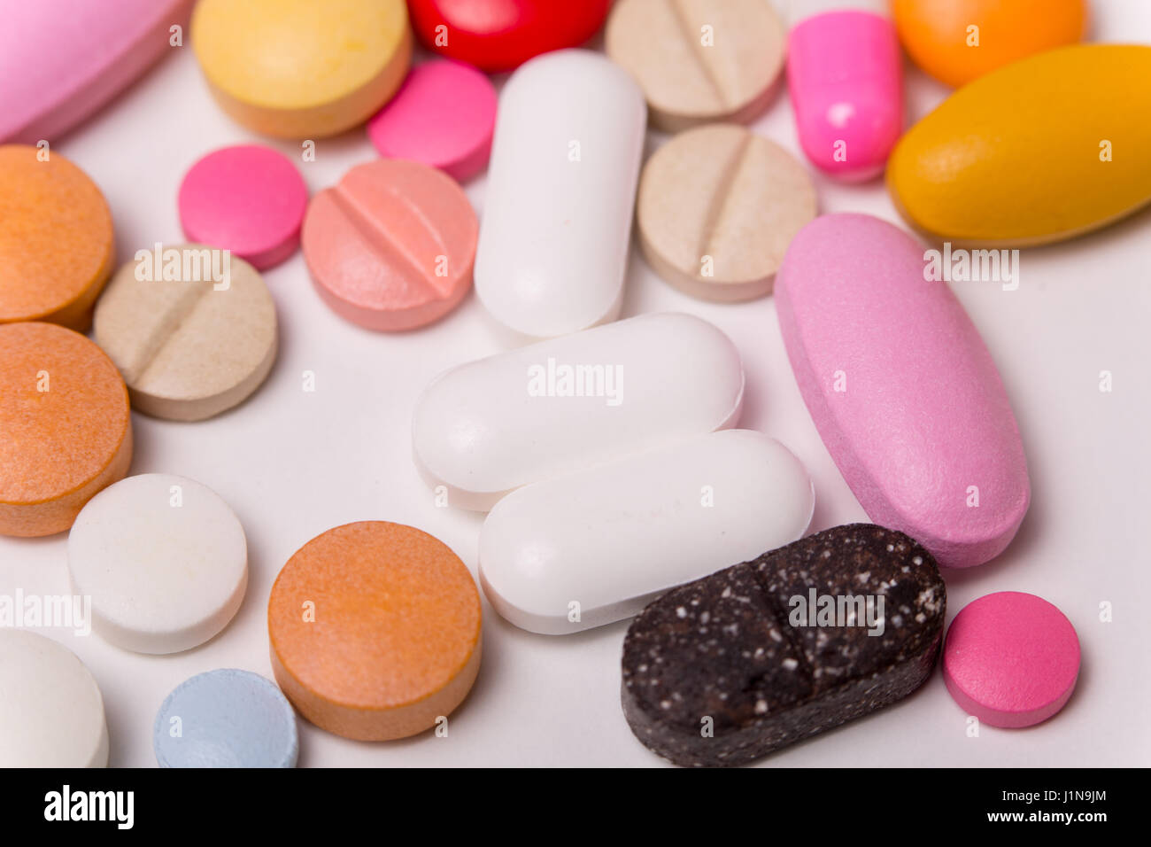 different Tablets pills capsule heap mix therapy drugs Stock Photo - Alamy