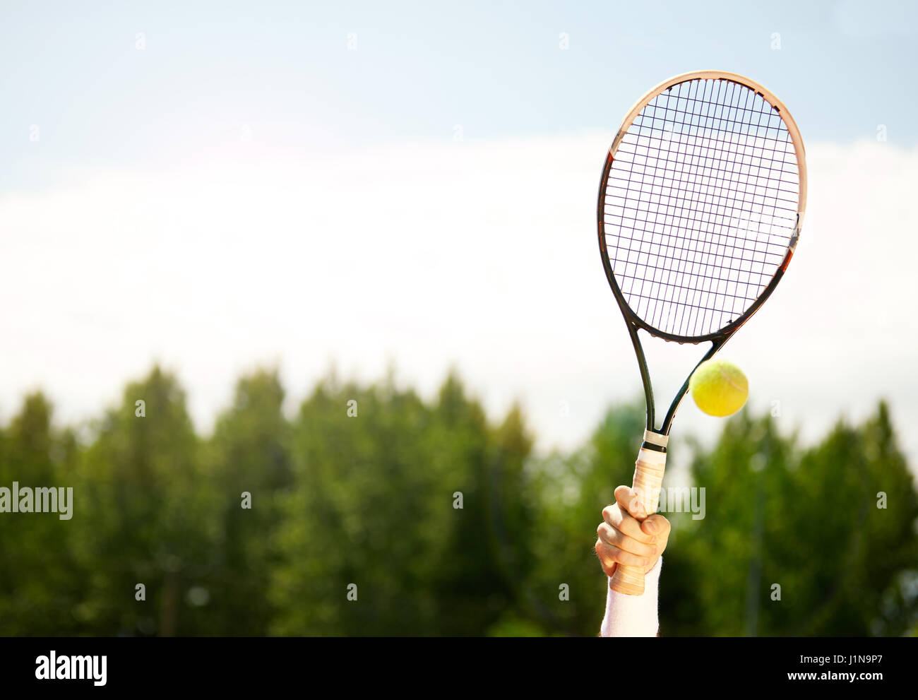Racket raised hi-res stock photography and images - Alamy