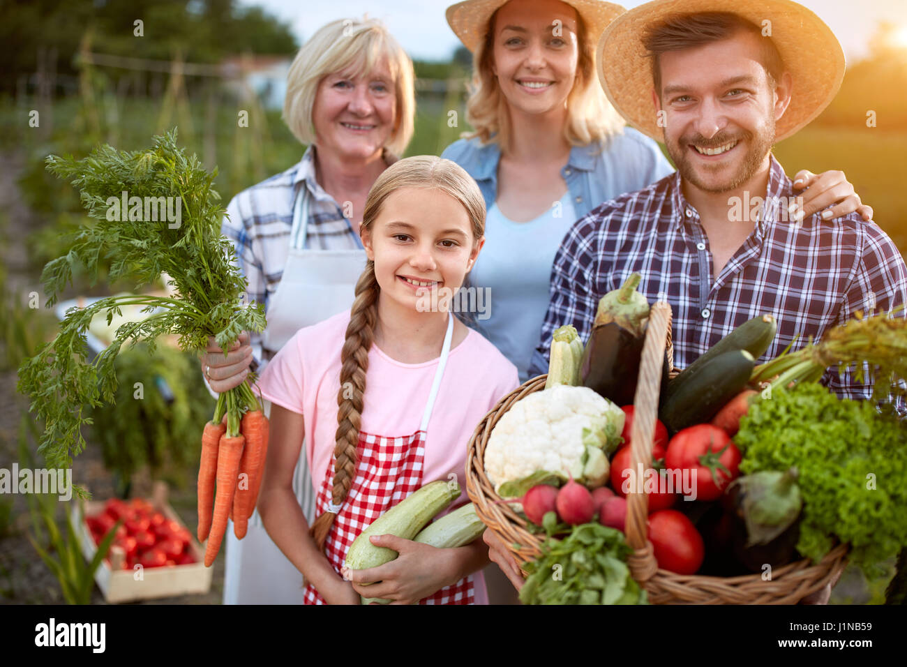 Portrait of farmers family, three generations Stock Photo - Alamy