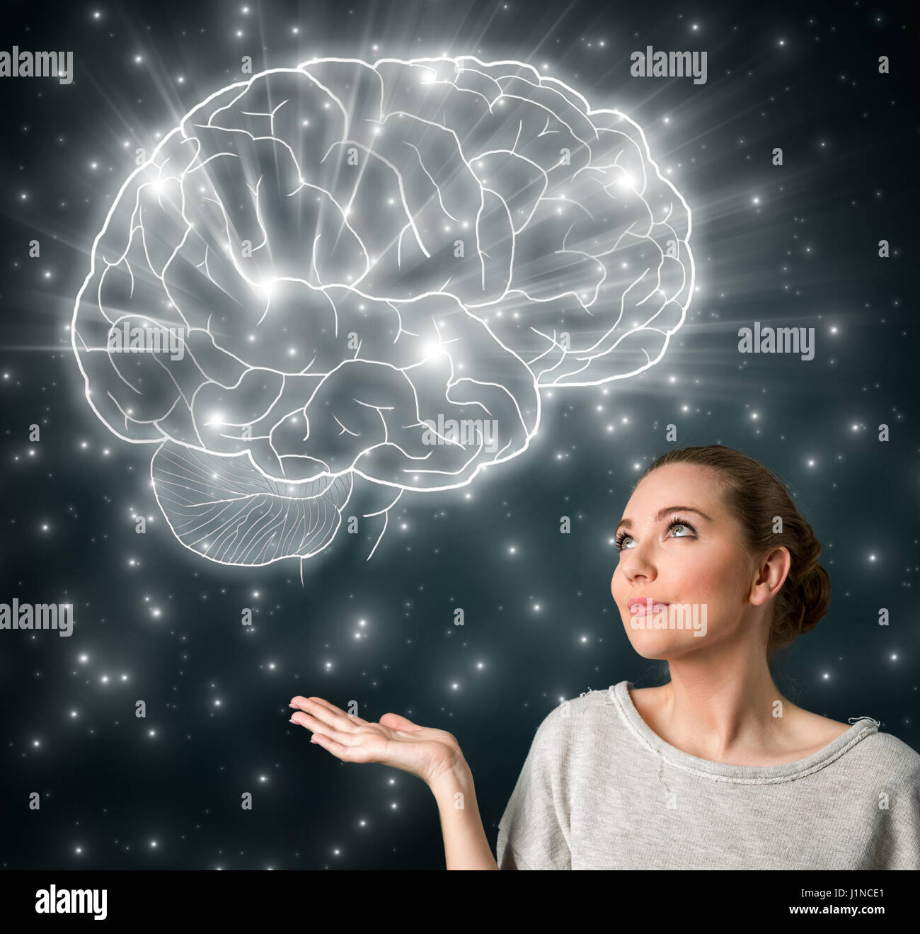 Young girl thinking with glowing brain illustration Stock Photo - Alamy