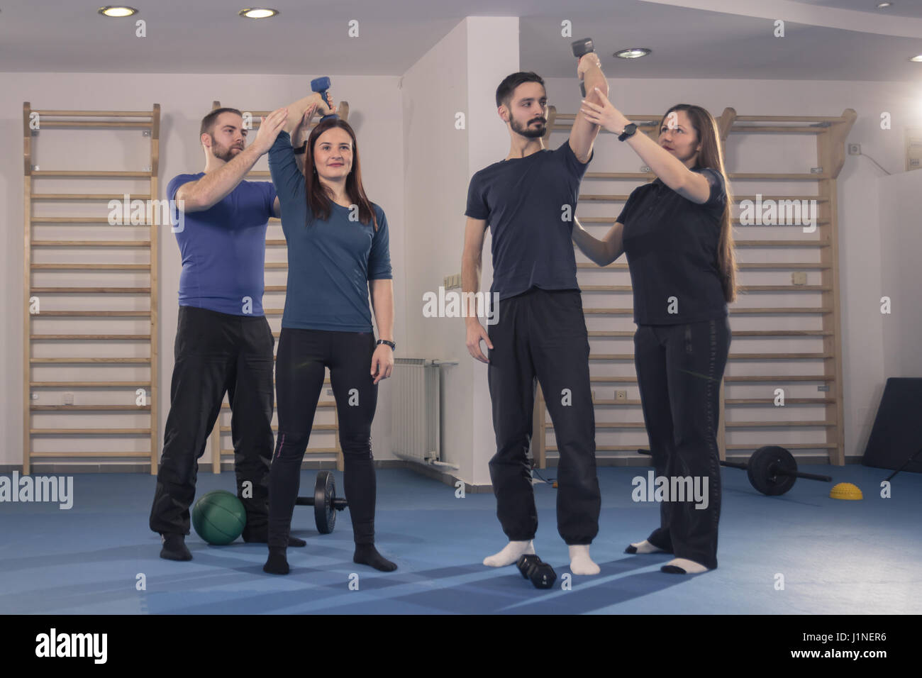 four young people group, two instructor, two trainer, showing learning ...