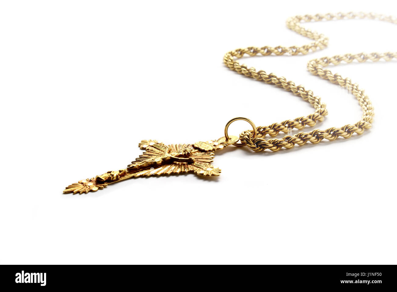 Gold crucifix hi-res stock photography and images - Alamy