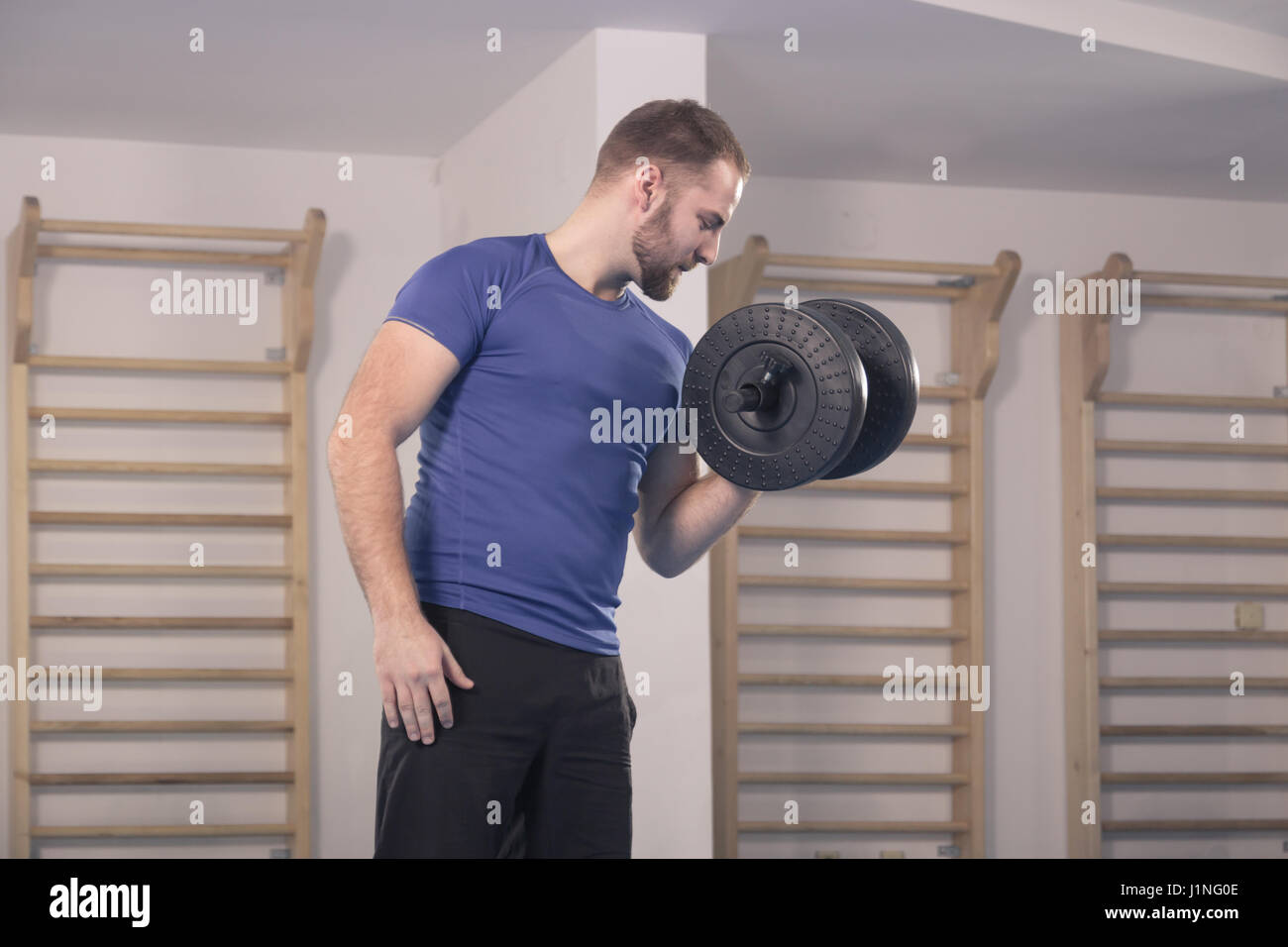 one young muscular large bulky man only, muscular effortless exercise ...