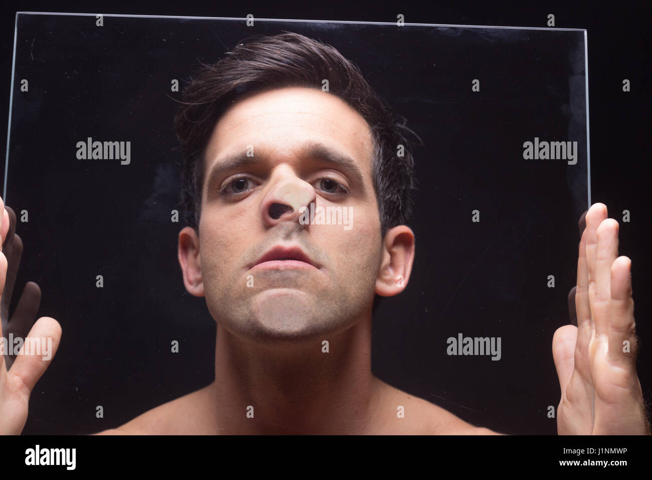 Face pressed against glass hi-res stock photography and images - Alamy