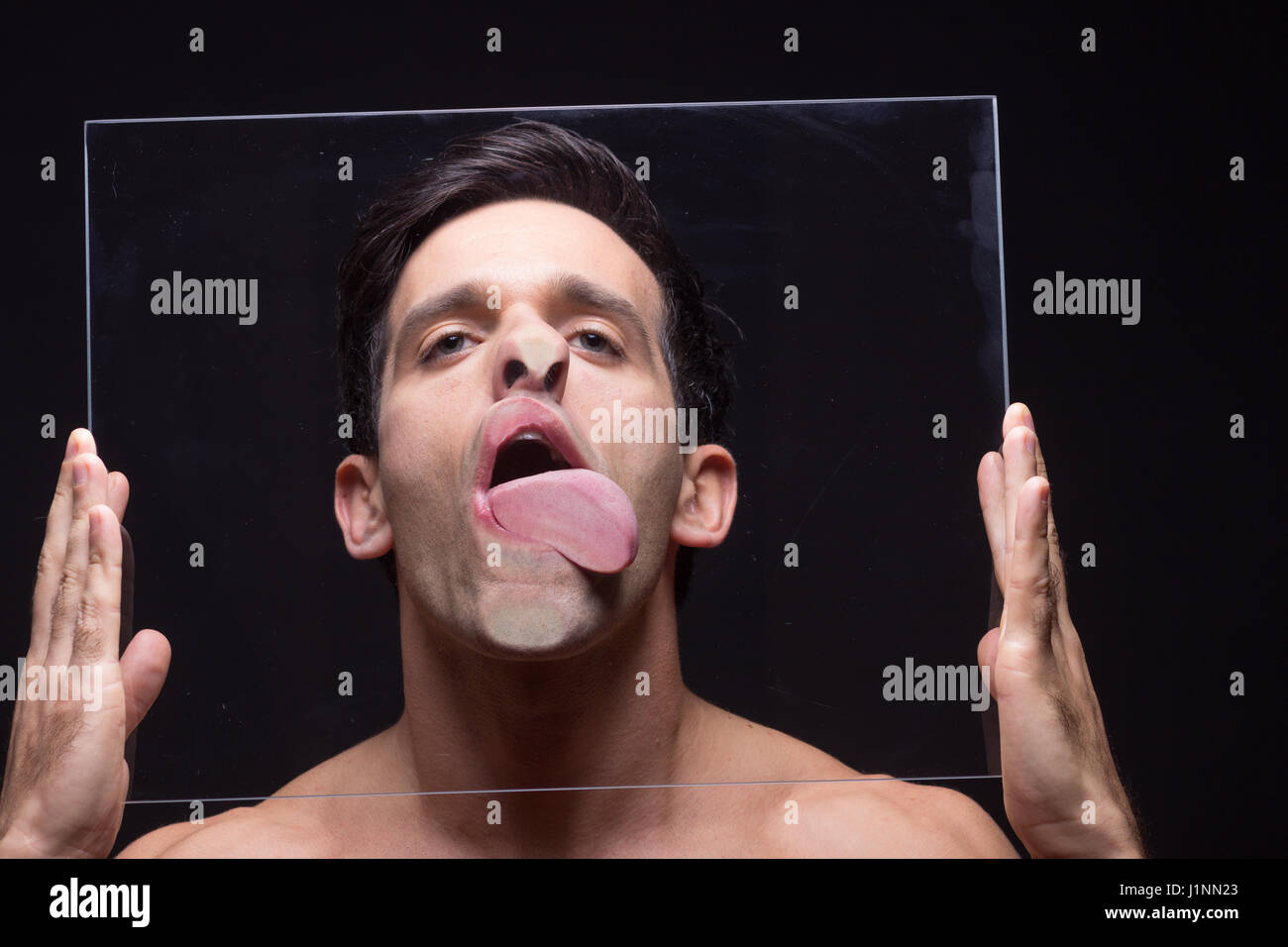 Face pressed against glass hi-res stock photography and images - Alamy