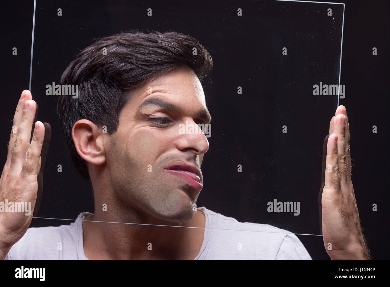 Face pressed against glass hi-res stock photography and images - Alamy