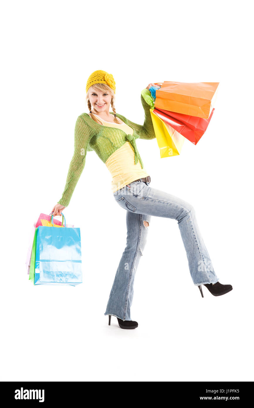 A beautiful caucasian girl carrying shopping bags Stock Photo - Alamy