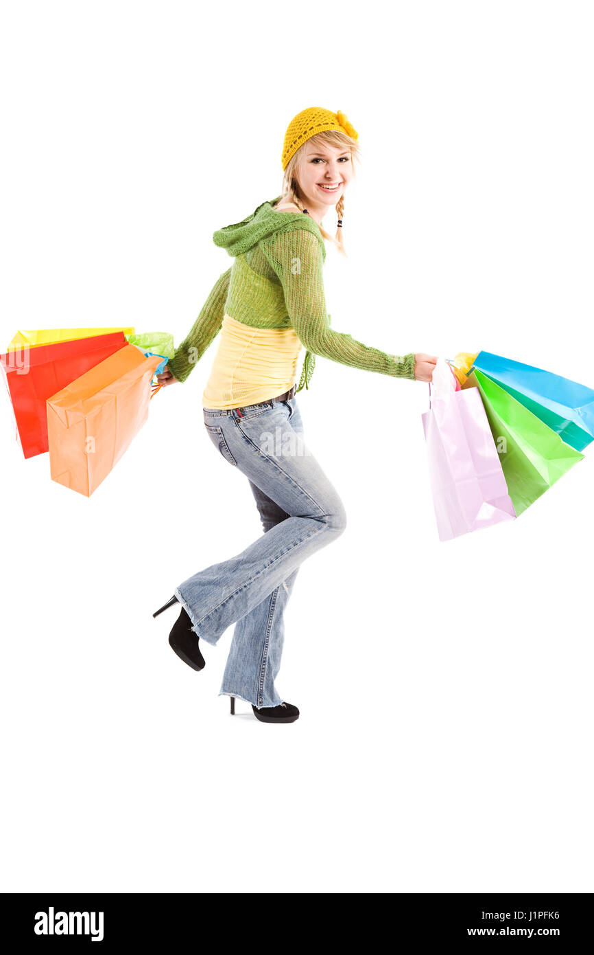 A beautiful caucasian girl carrying shopping bags Stock Photo - Alamy