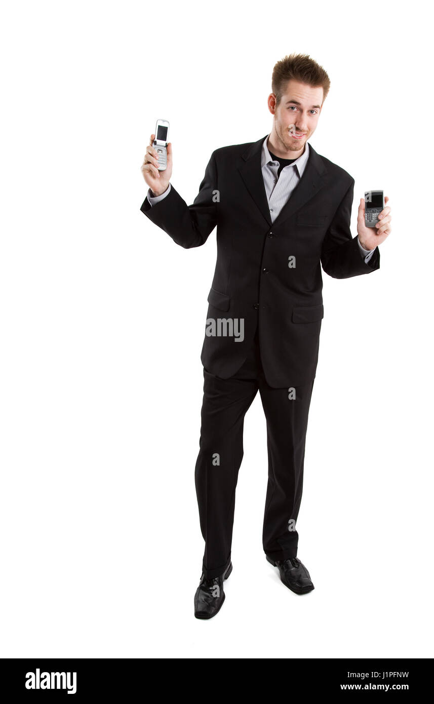 A caucasian businessman carrying two cell phones Stock Photo - Alamy
