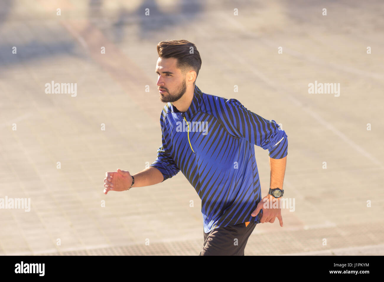 young man athlete runner exercise stairs steps outdoors Stock Photo - Alamy