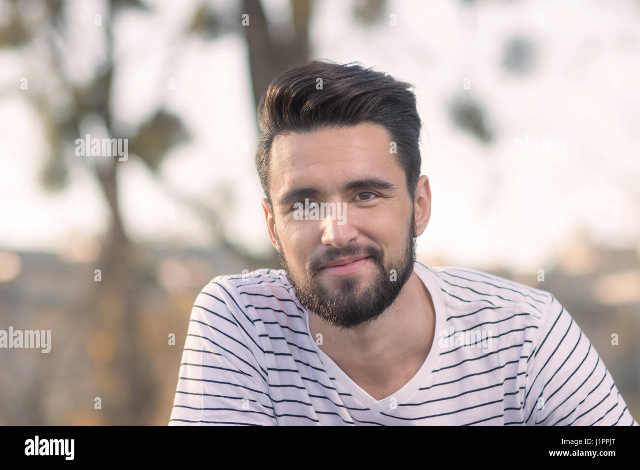 Young adult man, head, face close up. Cute, smiling, happy, positive ...