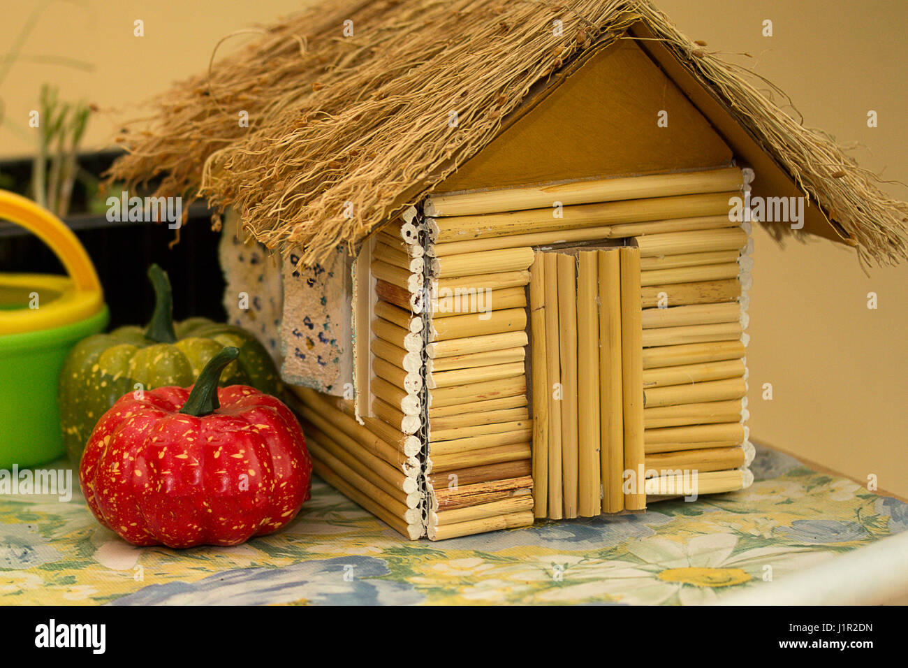 A small toy house made of wooden twigs Stock Photo - Alamy
