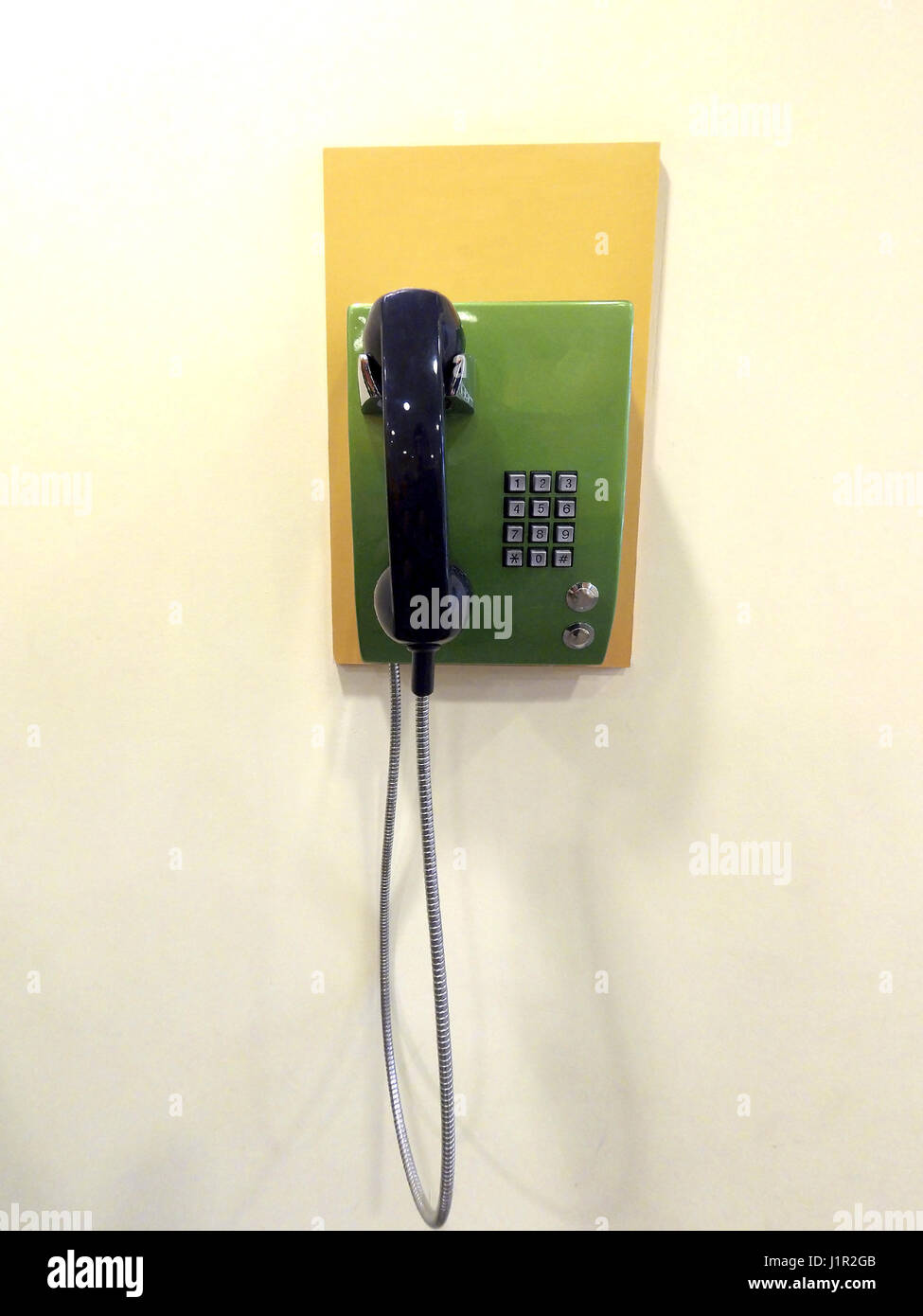 Vintage telephone hanging on the wall hi-res stock photography and ...